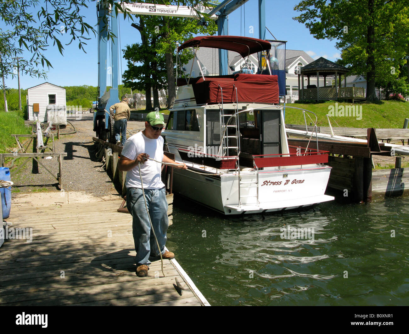 Preparing to launch watercraft into water Stock Photo - Alamy
