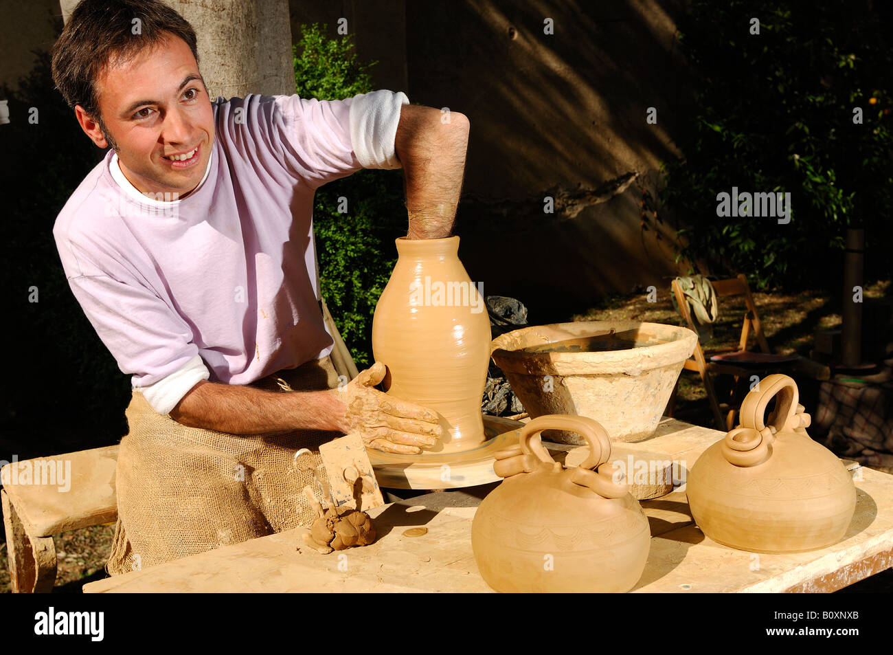 Ceramist creating a typical object by hand. Traditional technique Stock ...