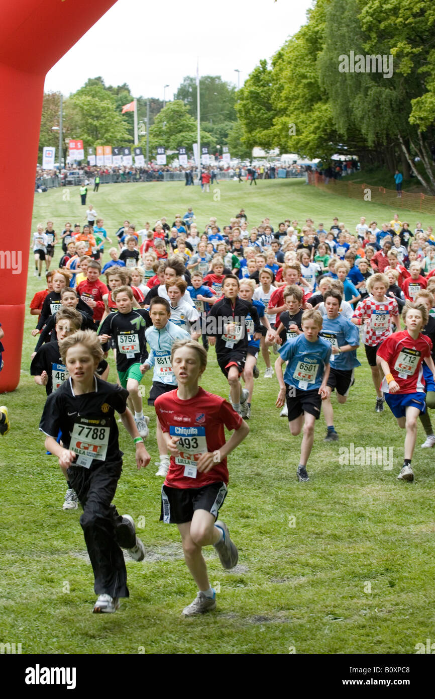 12year old boys running a race Stock Photo - Alamy
