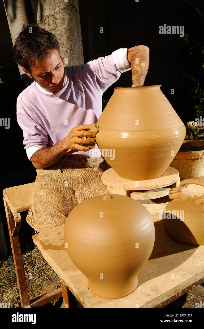 Ceramist creating a typical object by hand. Traditional technique Stock ...