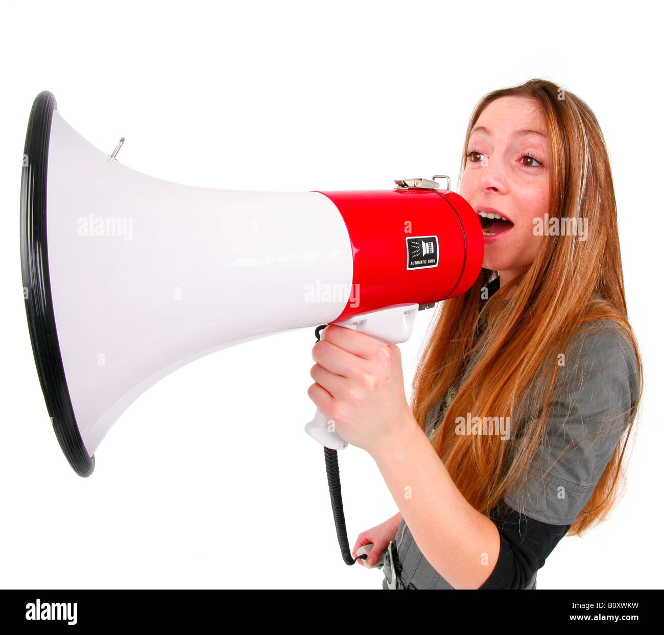 young handsome women screaming into a megaphone Stock Photo - Alamy