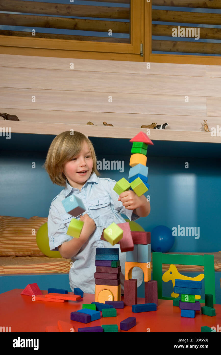 Person moving brick blocks hi-res stock photography and images - Alamy