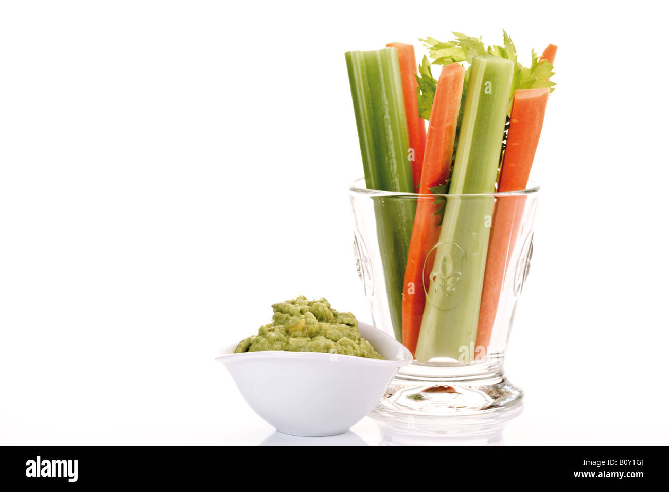 Guacamole with vegetable sticks Stock Photo - Alamy