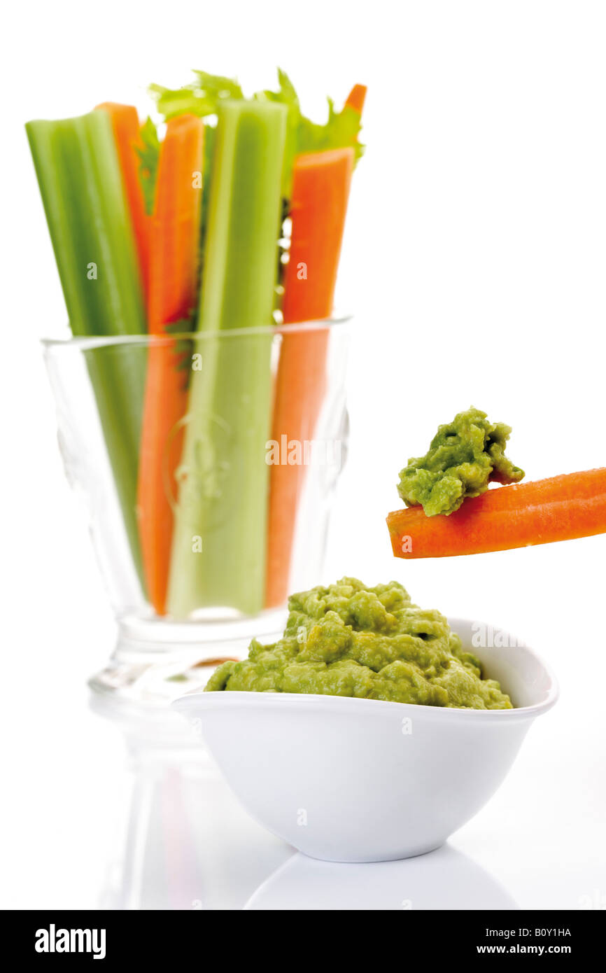 Guacamole with vegetable sticks Stock Photo - Alamy