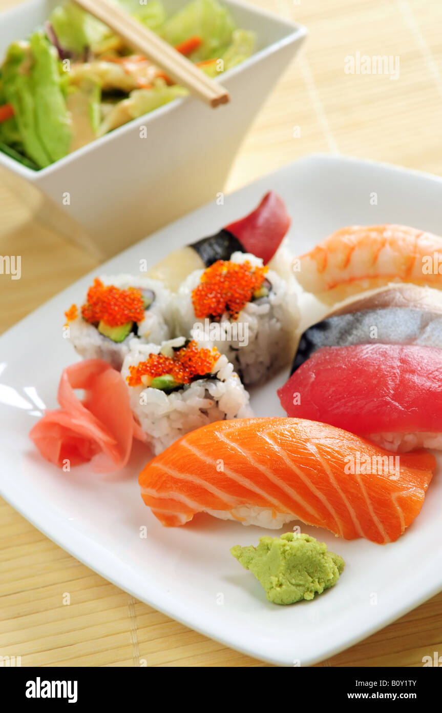Lunch of assorted sushi and green salad Stock Photo - Alamy