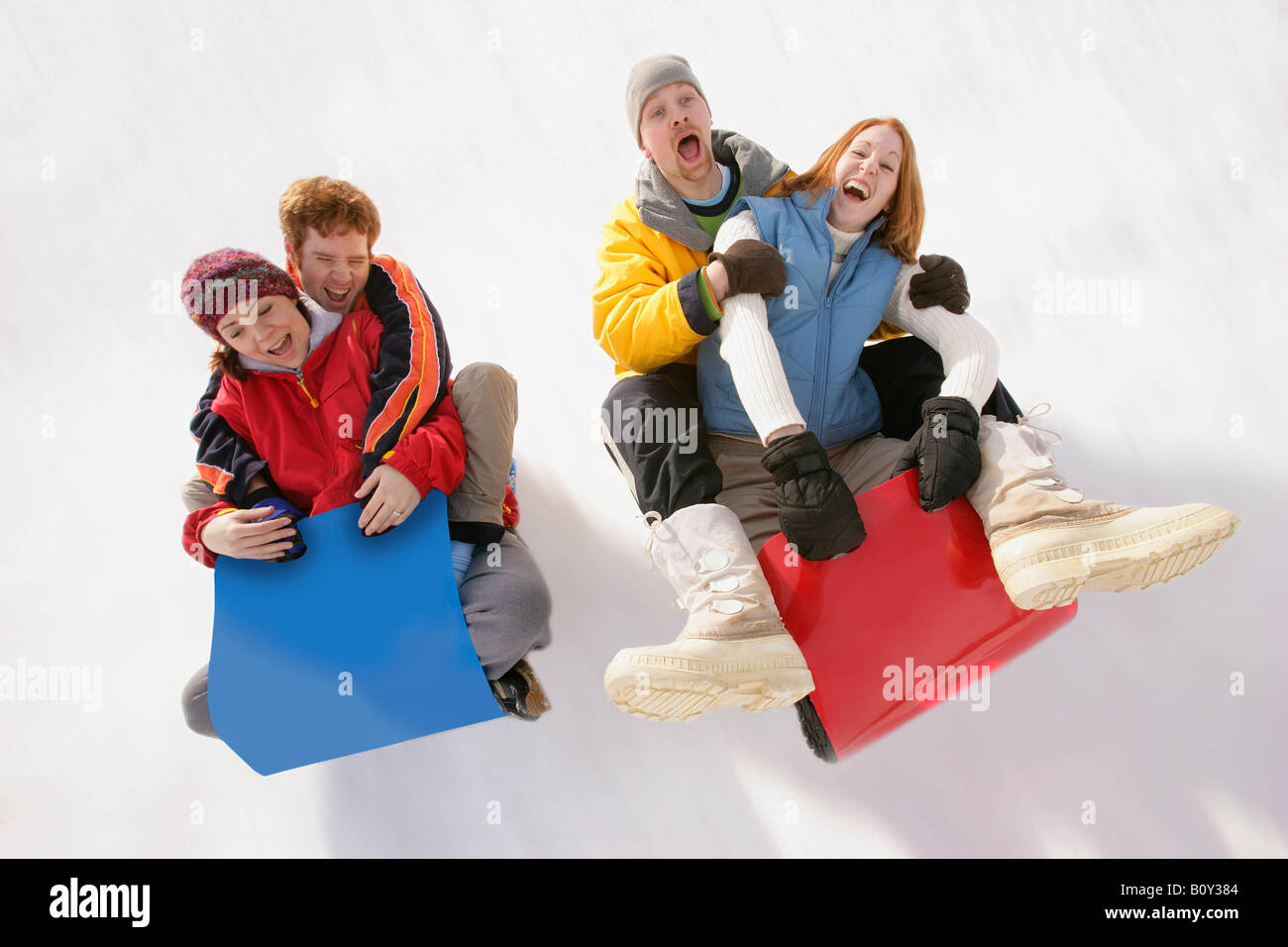 Sliding down a hill Stock Photo - Alamy