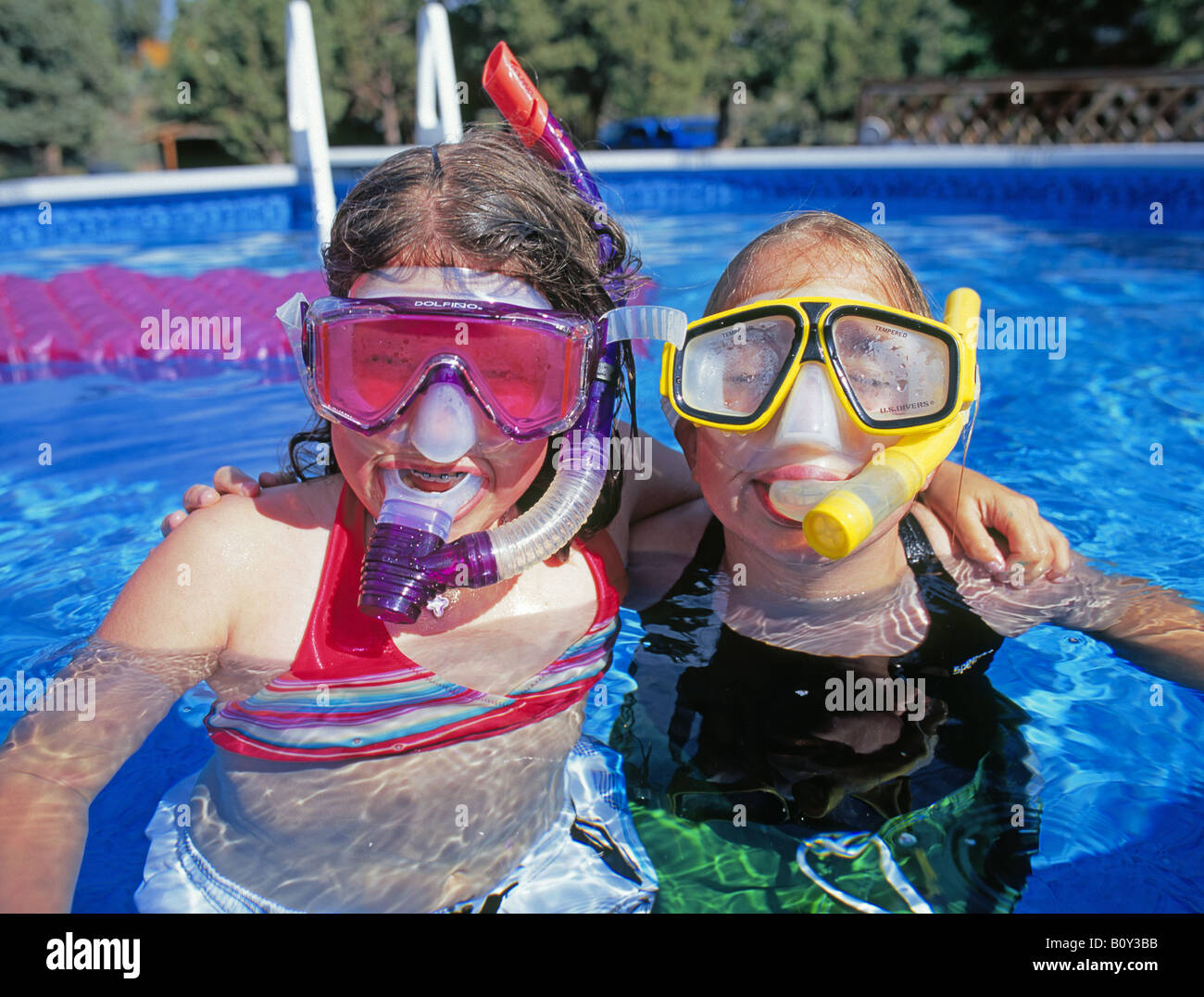 USA OREGON BEND Two best friends share a summer afternoon snorkling in ...