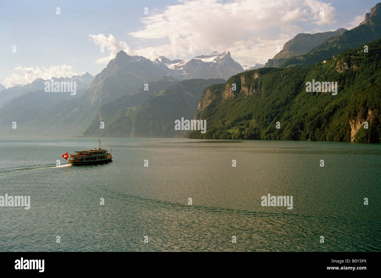 Ferry on Alpine lake, Lake Lucerne Switzerland with snow on mountains ...