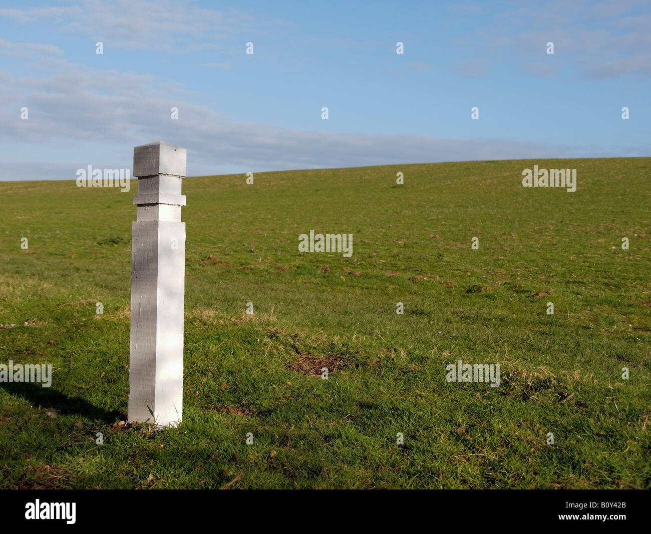White Post Green Grass Blue Sky Stock Photo - Alamy