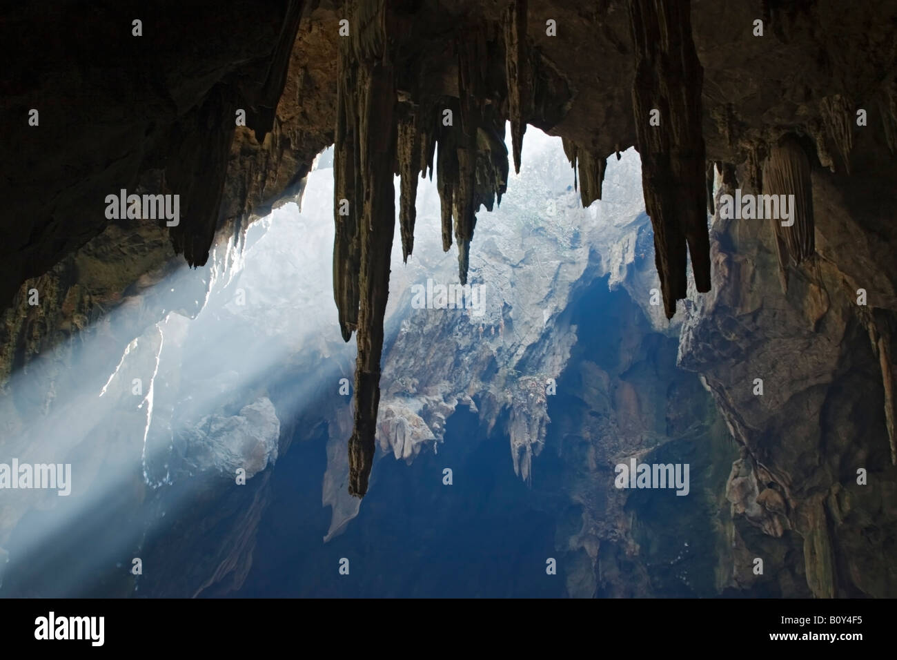 Ray of Light shining into cave Stock Photo - Alamy