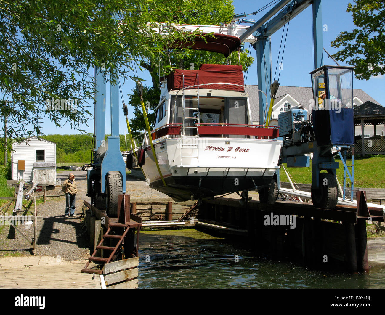Preparing to launch watercraft into water Stock Photo - Alamy