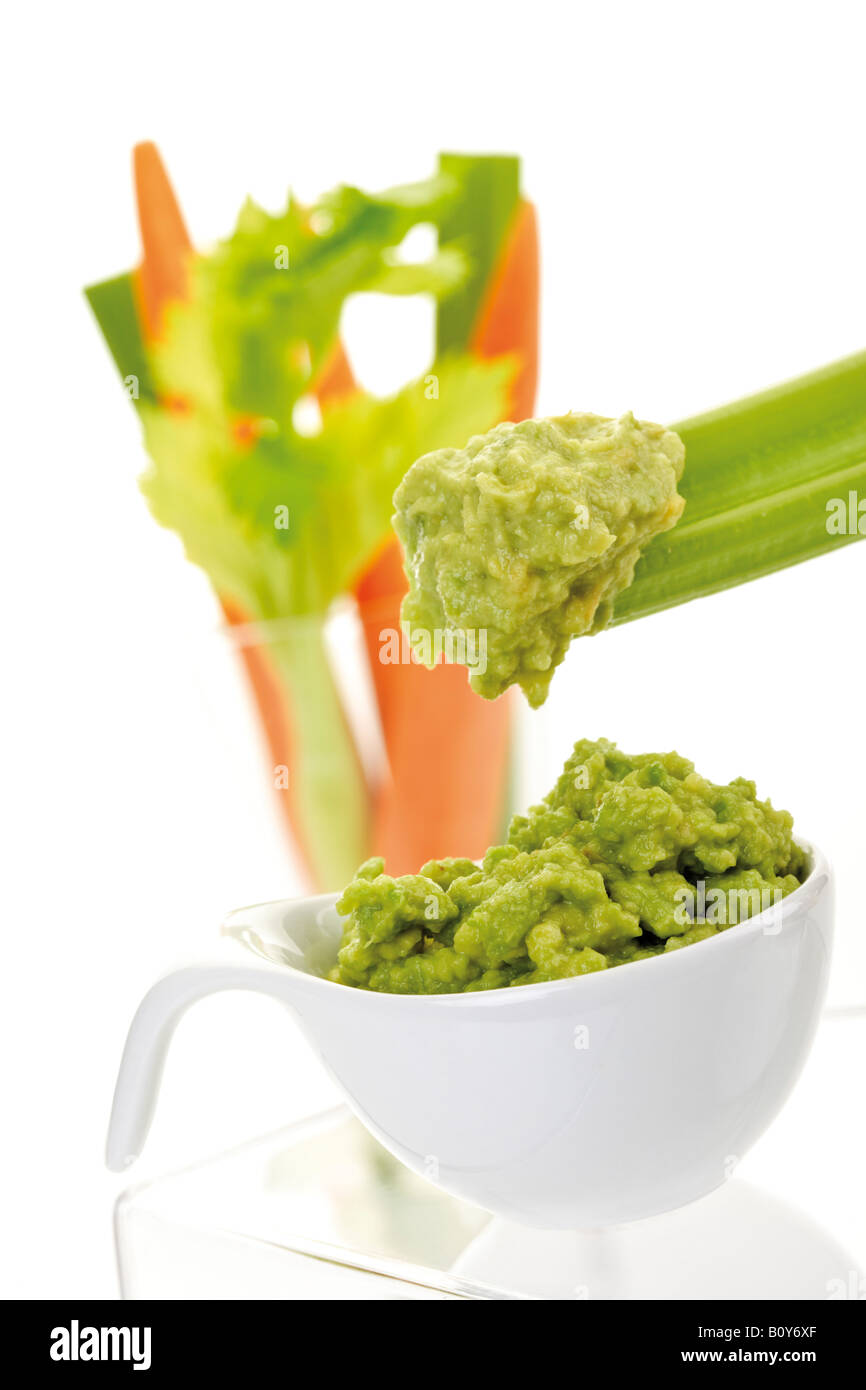 Guacamole with vegetable sticks Stock Photo - Alamy