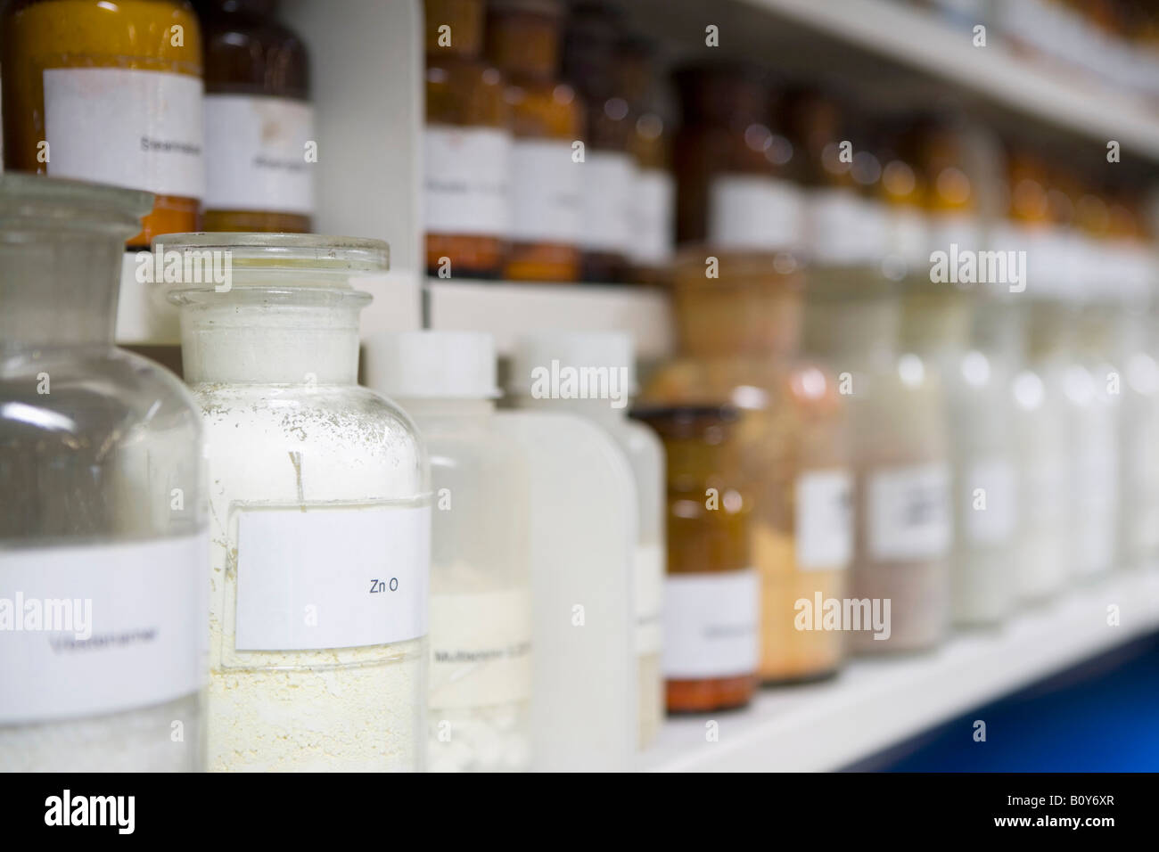 Bottles on shelf in laboratory Stock Photo - Alamy