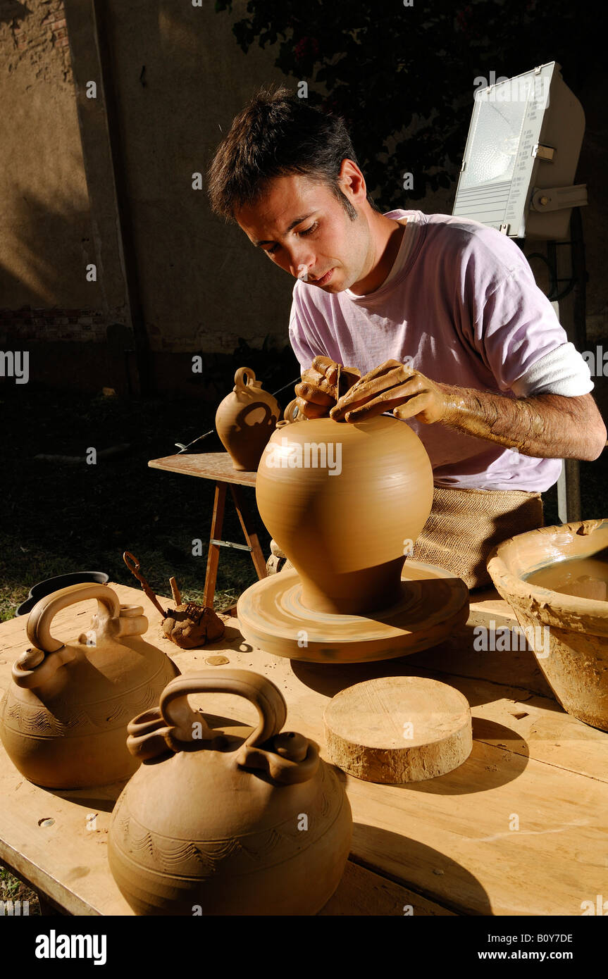 Ceramist creating a typical object by hand. Traditional technique Stock ...