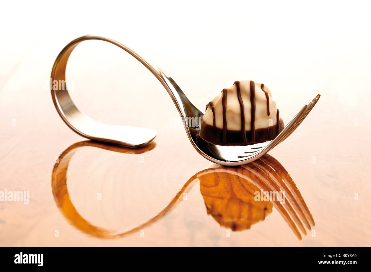 Praline on fork Stock Photo - Alamy