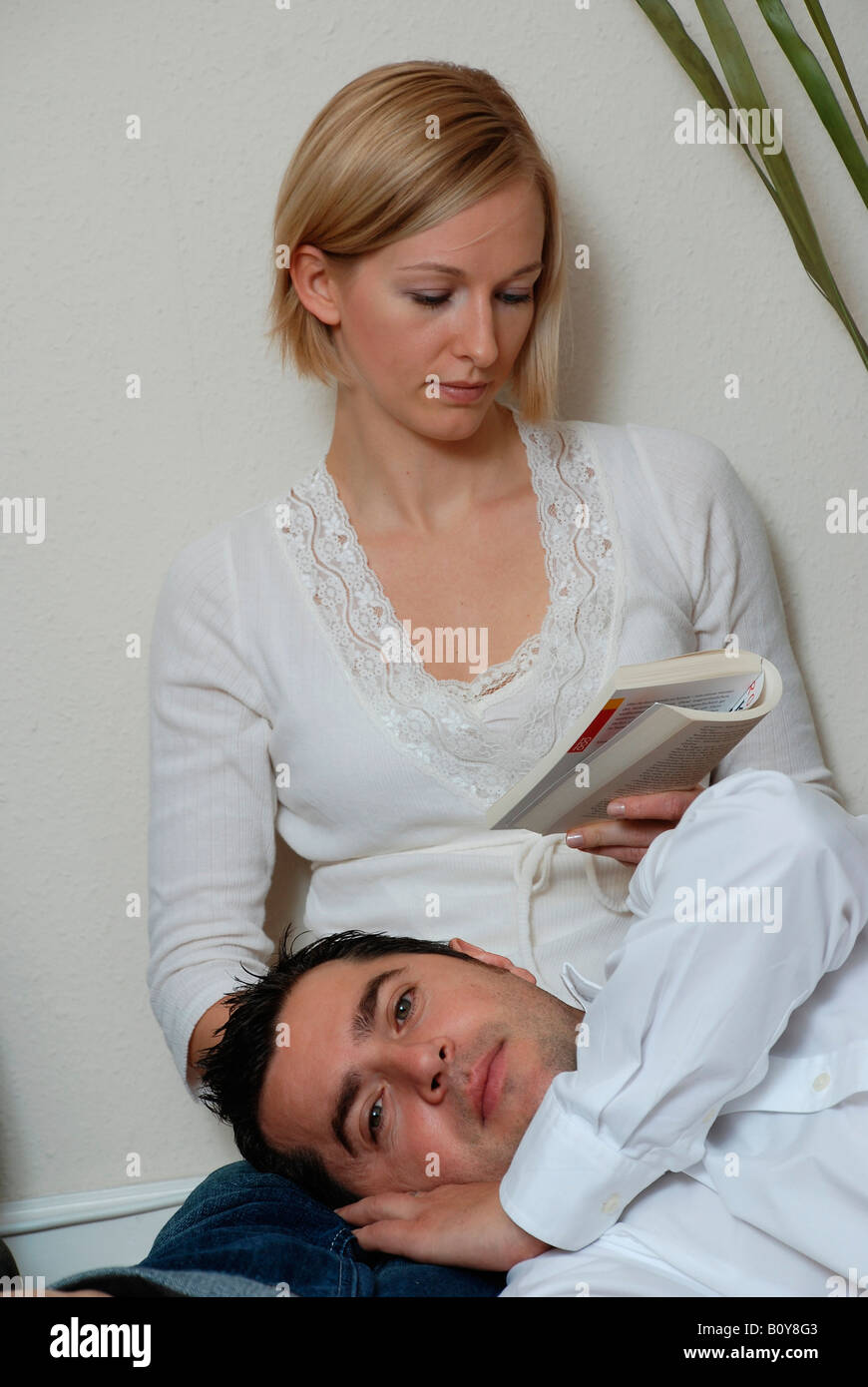 Female resting on friends lap hi-res stock photography and images - Alamy
