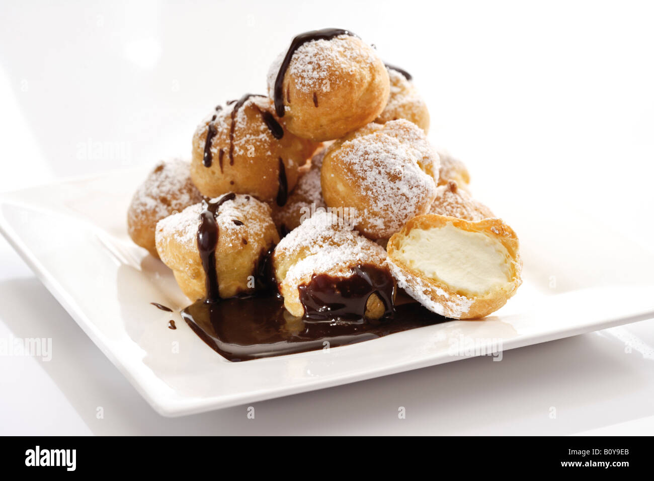 Cream puffs on plate hi-res stock photography and images - Alamy