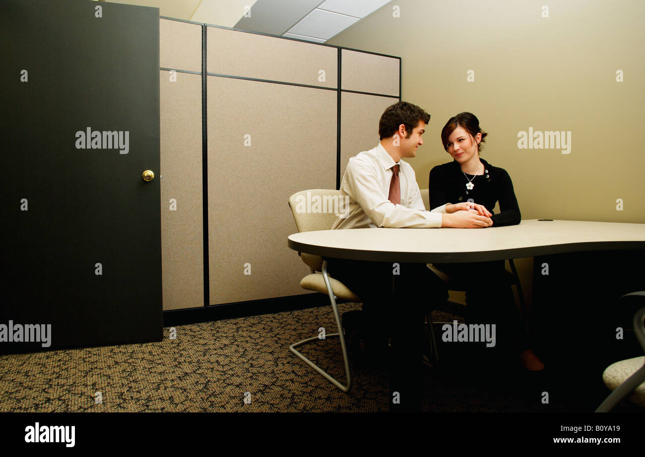 Couple in the work place Stock Photo - Alamy