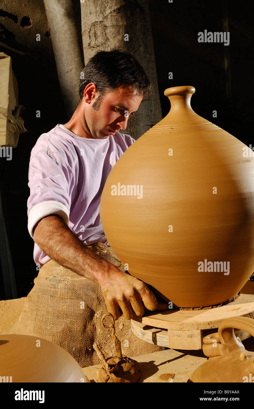 Ceramist creating a typical object by hand. Traditional technique Stock ...