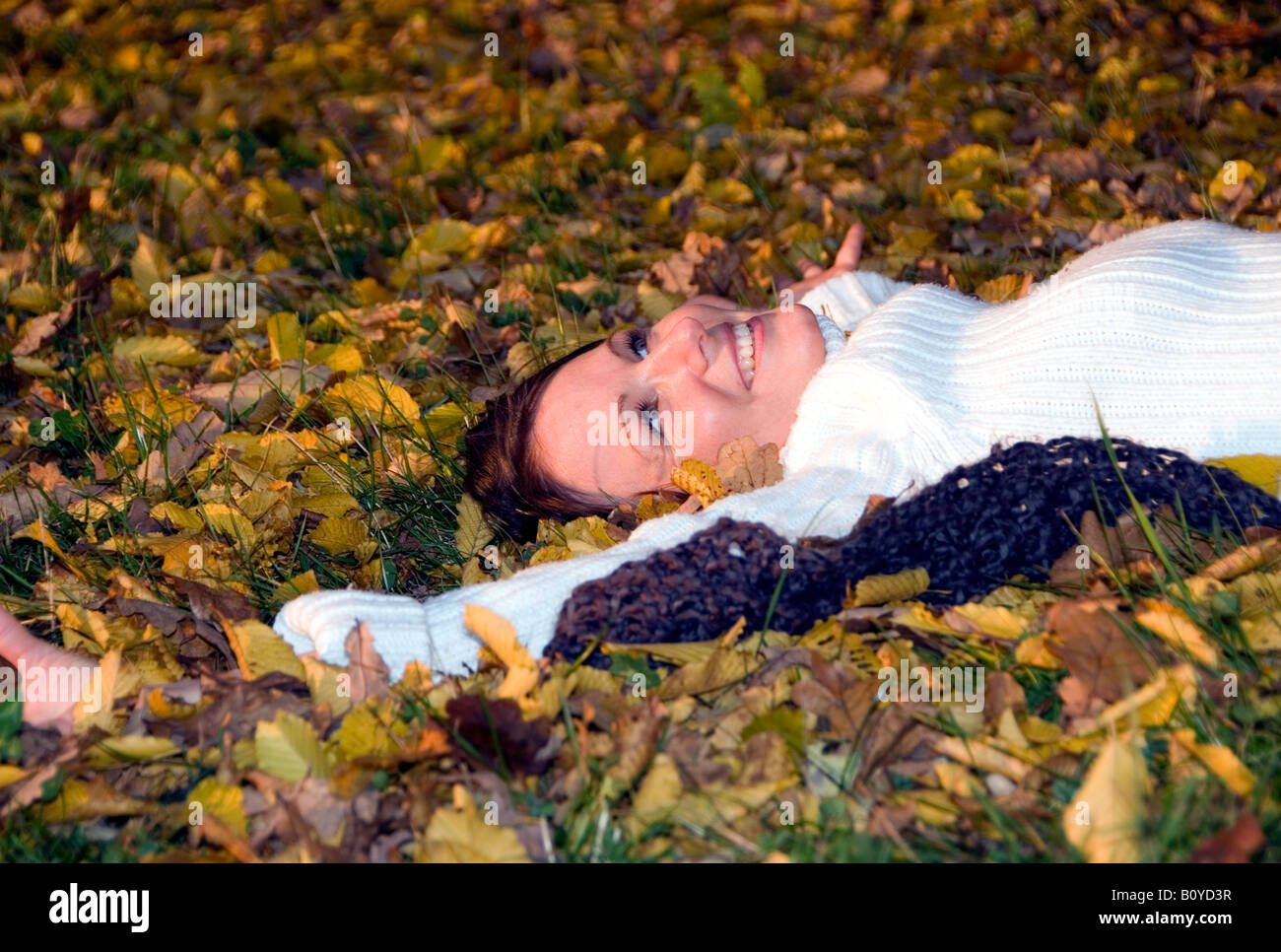 Woman lying being stretched hi-res stock photography and images - Alamy