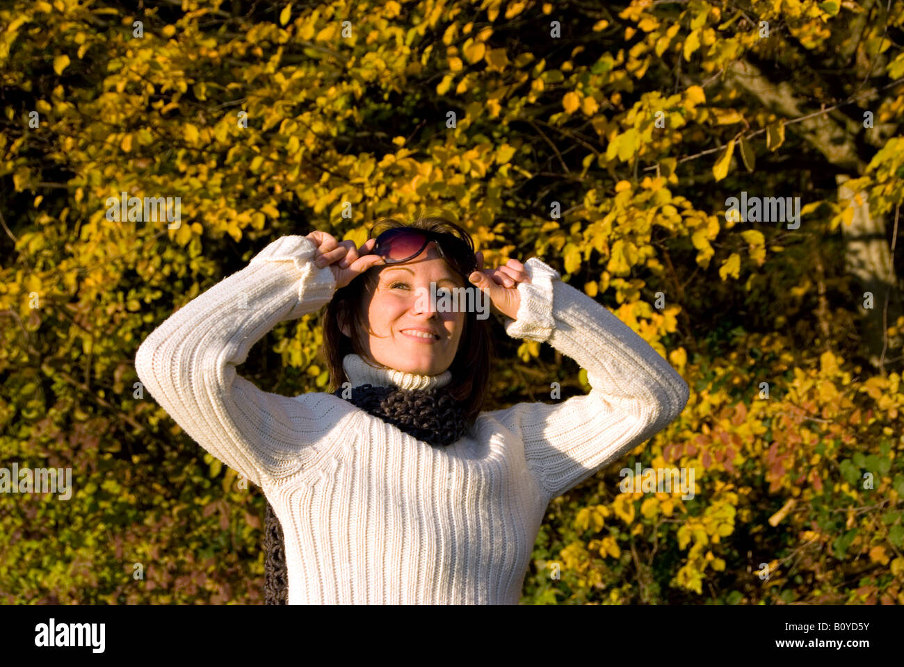Scarf smiling expressions glasses hi-res stock photography and images ...