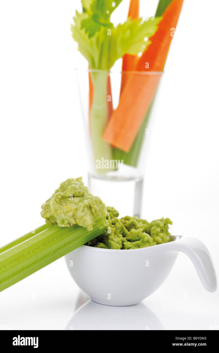 Guacamole with vegetable sticks Stock Photo - Alamy