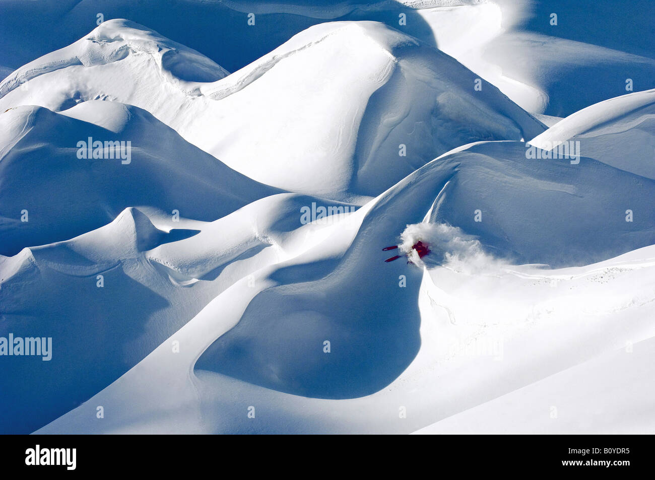skier in deep powder snow in the ski resort Tignes, France, Alps ...