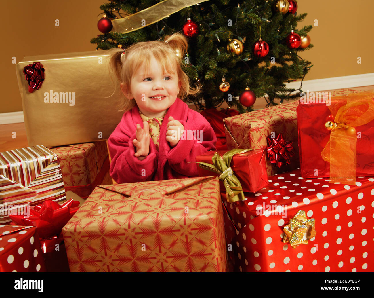 A child excited about Christmas Stock Photo - Alamy