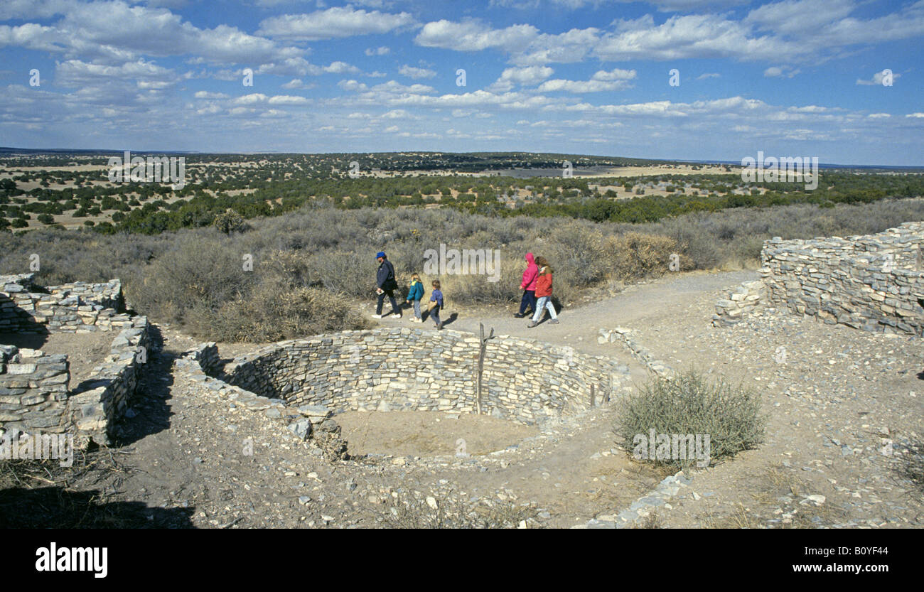 Visitors examine a Pueblo indian kiva at an old Anasazi Indian town in ...