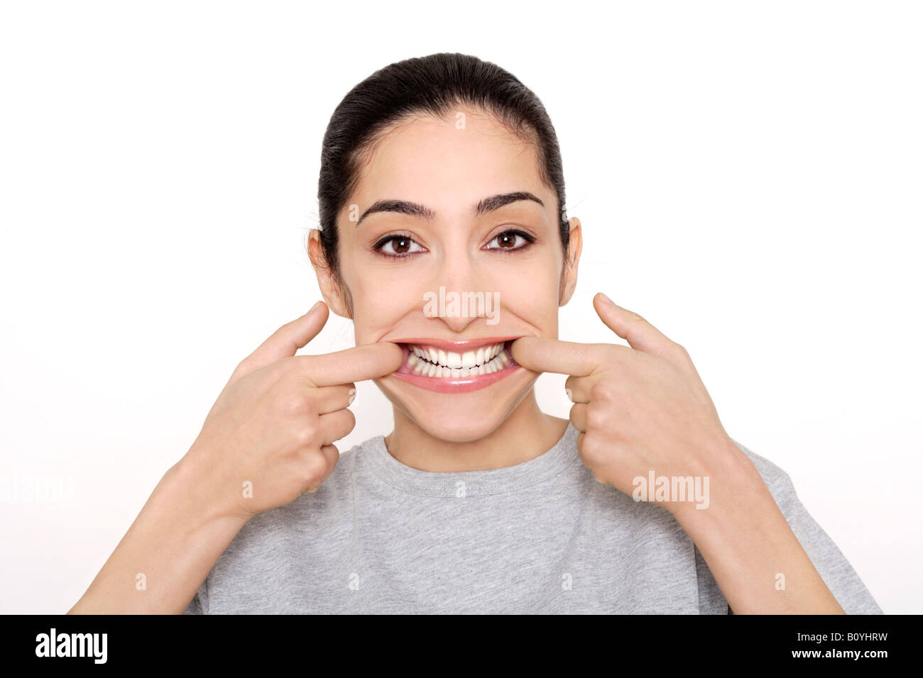 Portrait, Stretching Mouth of a Woman Stock Photo - Alamy