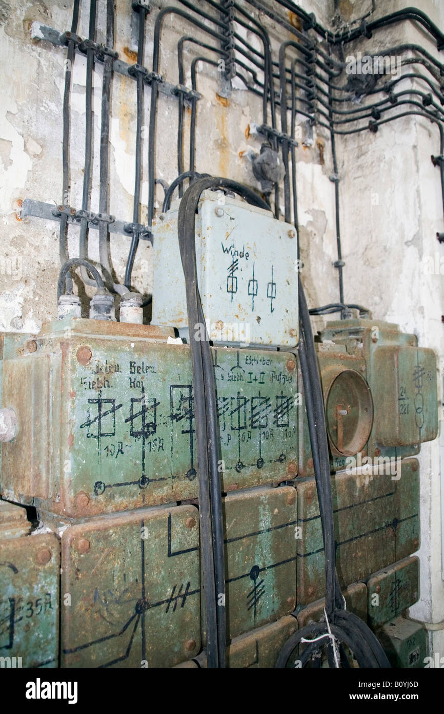 Cables on old wall Stock Photo - Alamy