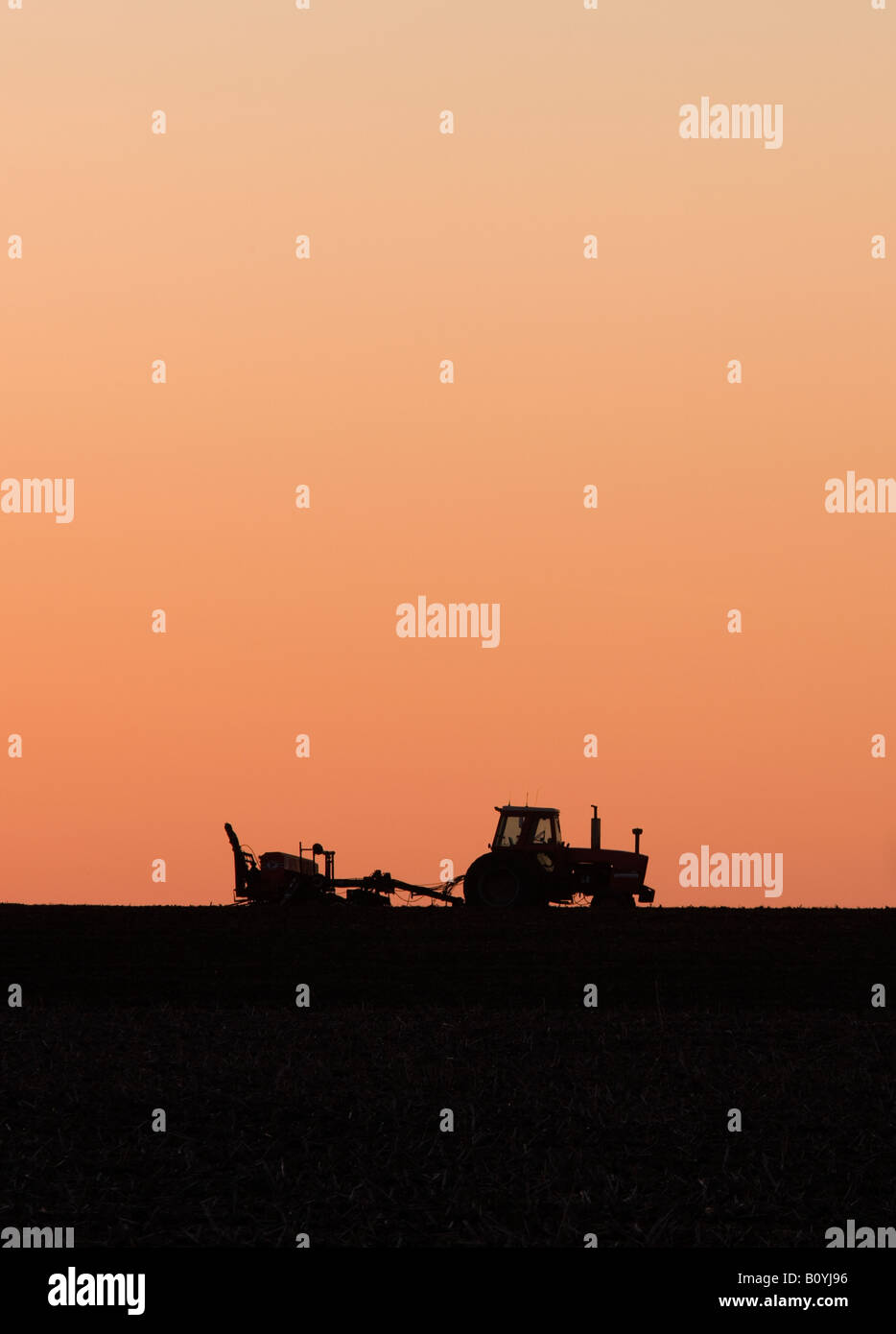 tractor and planter at daybreak, Iowa Stock Photo - Alamy