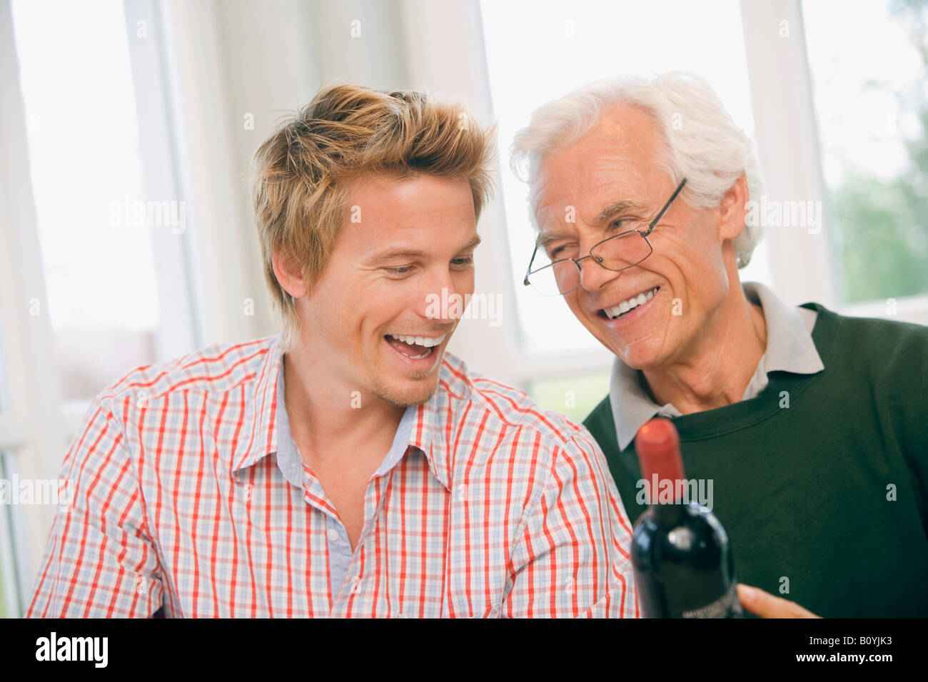 Two men smiling, portrait Stock Photo - Alamy