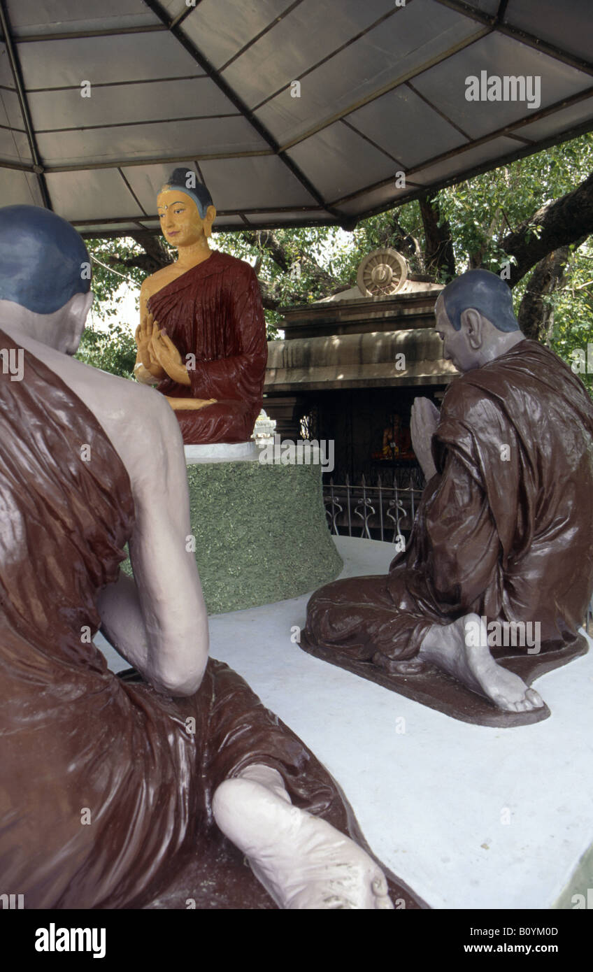 Statues depicting Buddha giving first sermon to disciples SARNATH UTTAR ...