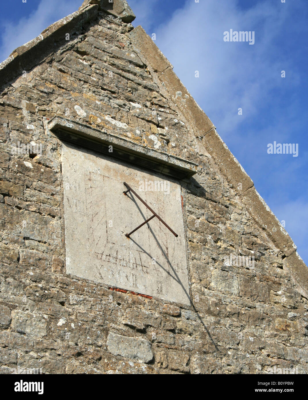 An ancient sundial casts a time shadow Stock Photo - Alamy