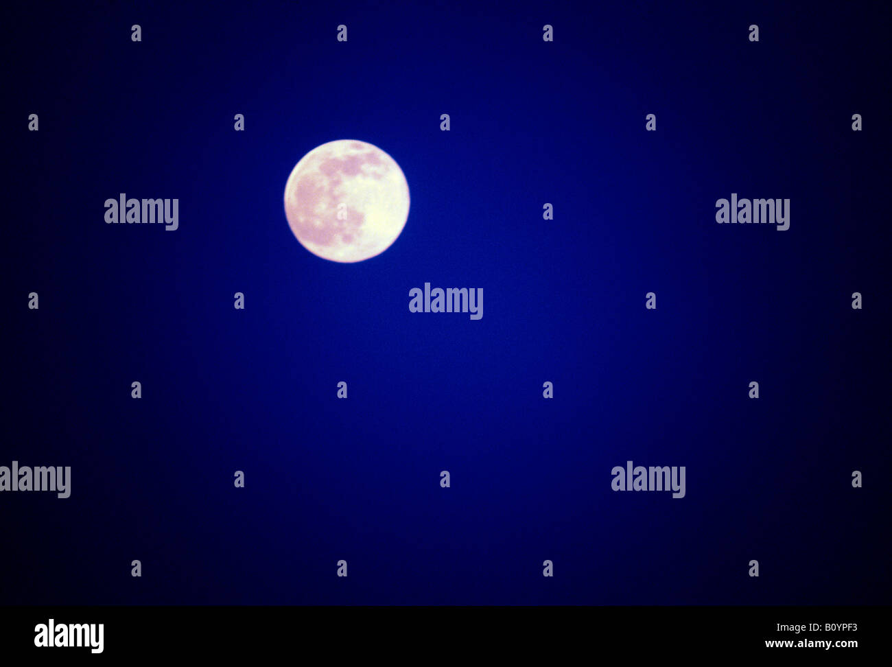 Full Moon In Daylight Sky Stock Photo - Alamy