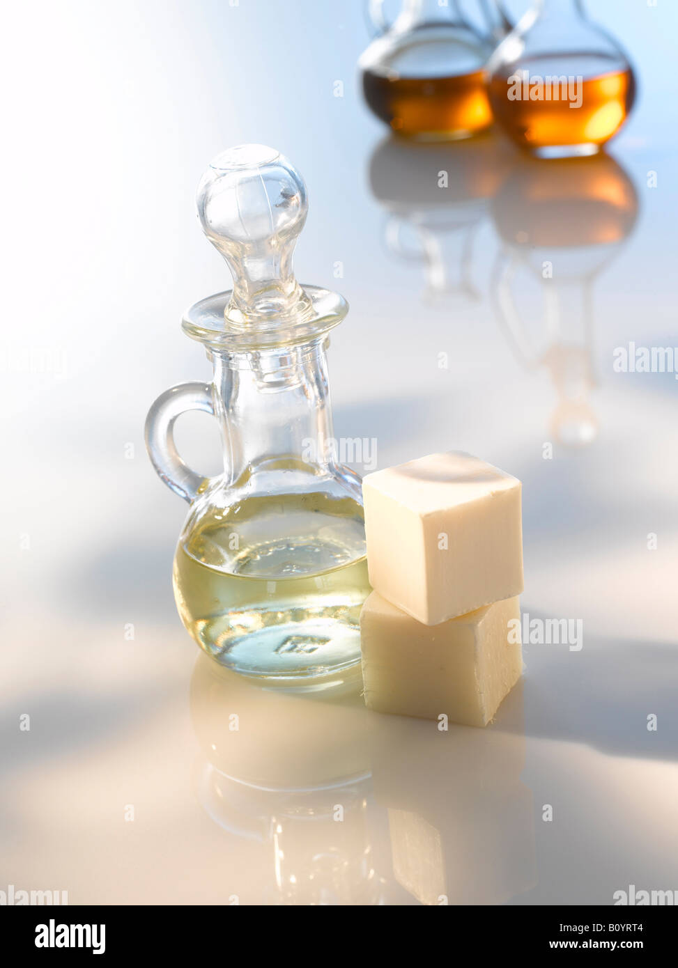 Three carafes, two cakes of soap Stock Photo - Alamy