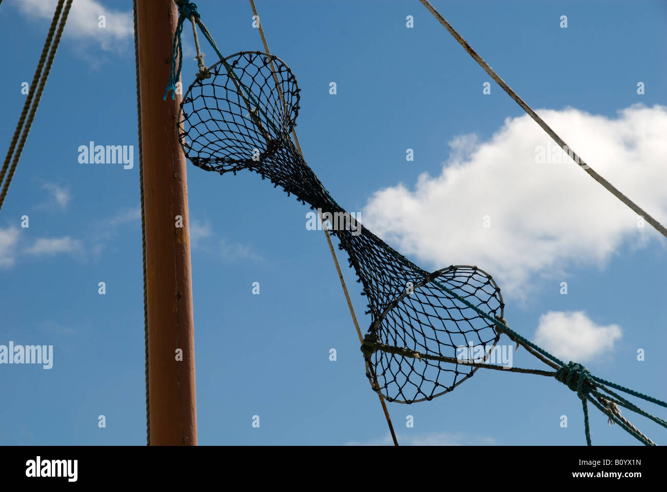 Cone shaped nets on an old trawler moored outside the Shetland Museum ...
