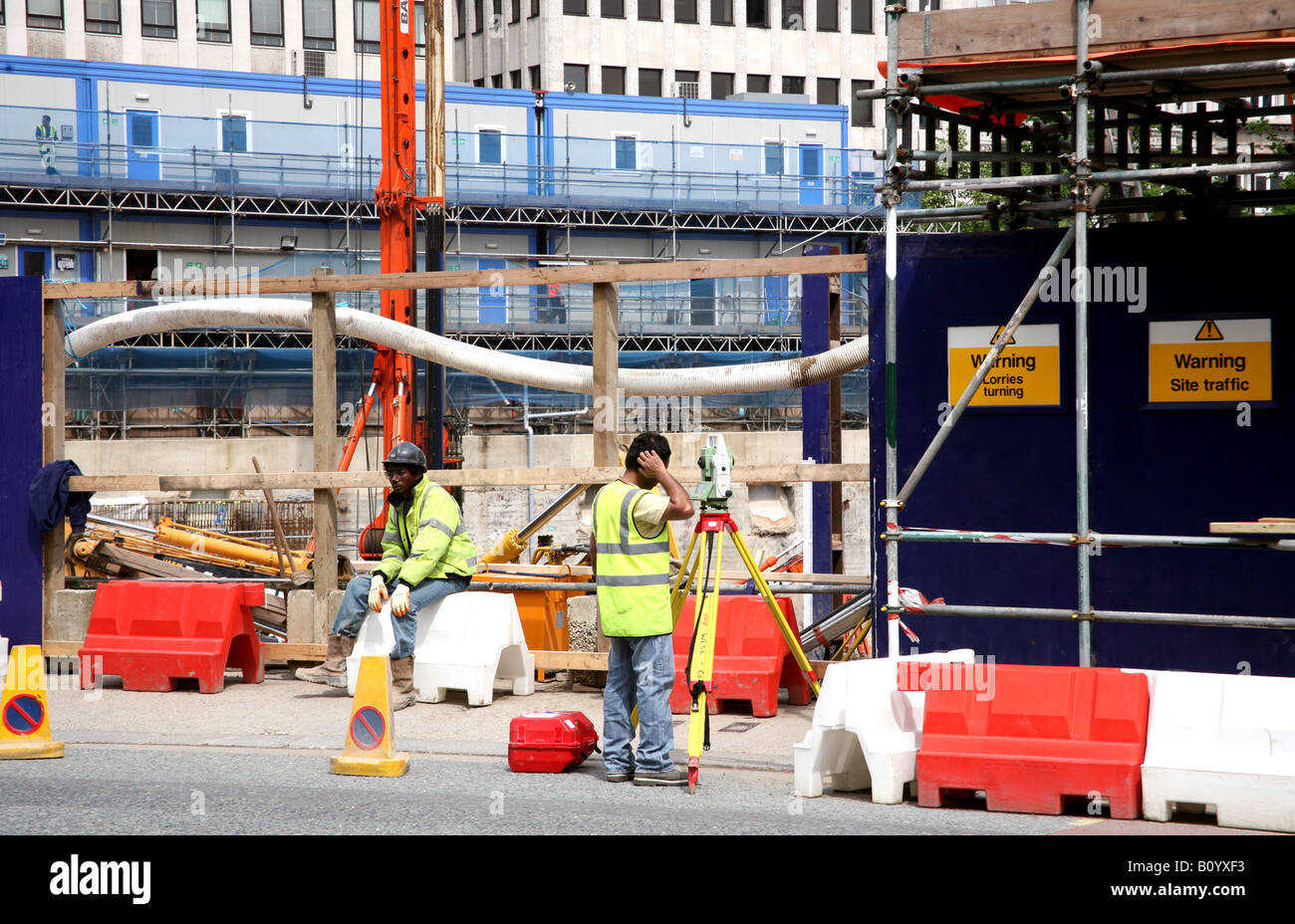 Construction workers take break on hi-res stock photography and images ...