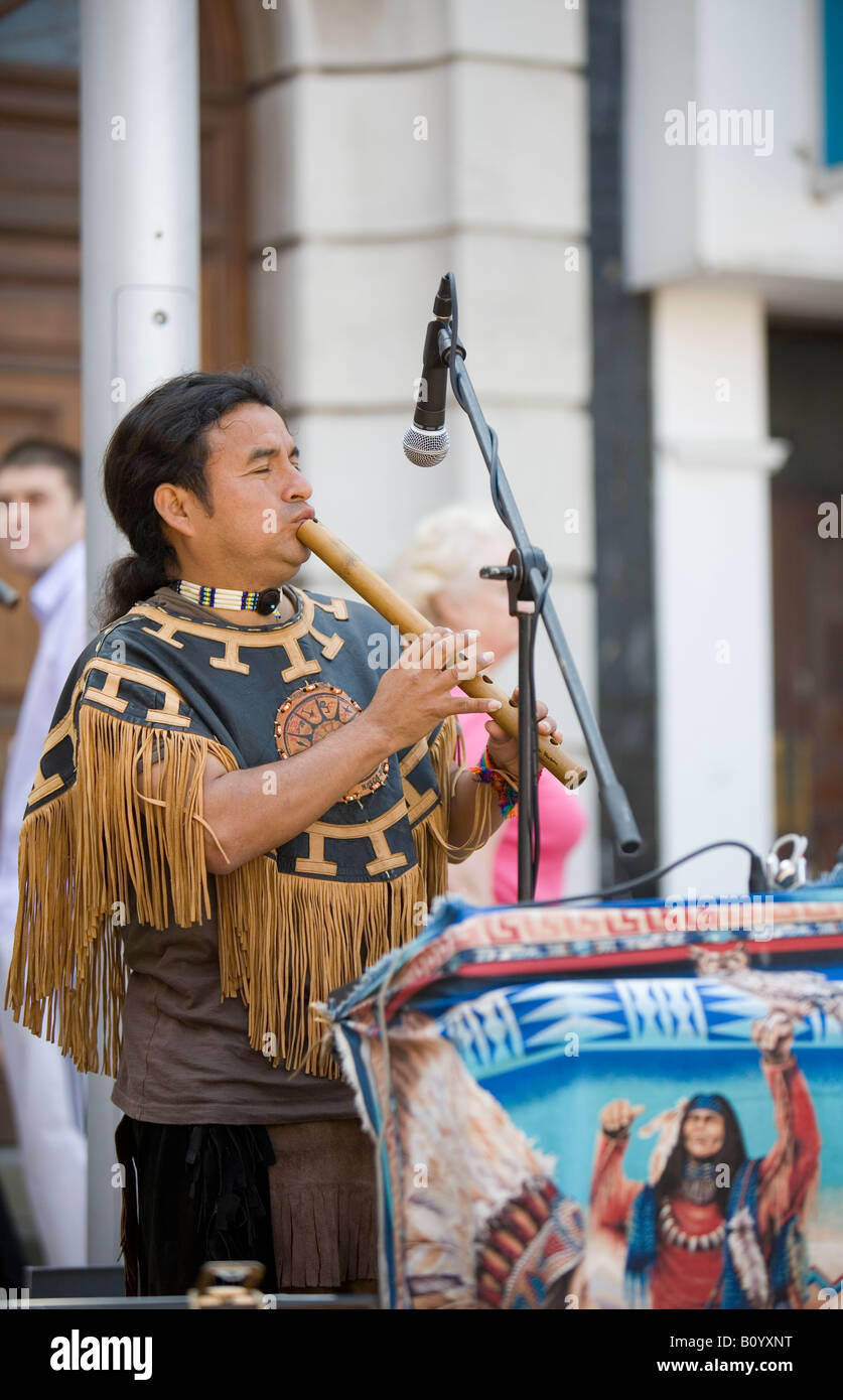 Native American red indian busker playing the flute in Great Yarmouth ...