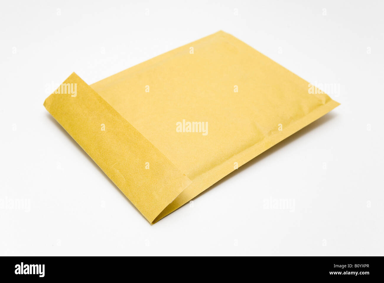 Thick envelope over white background Stock Photo - Alamy