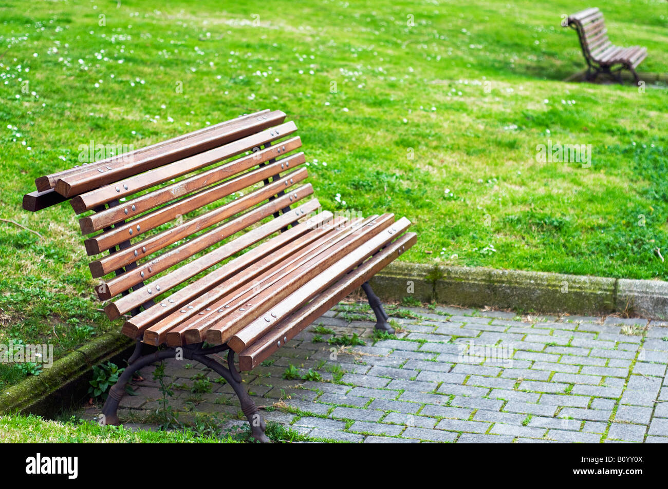 Empty seats in the park Stock Photo - Alamy
