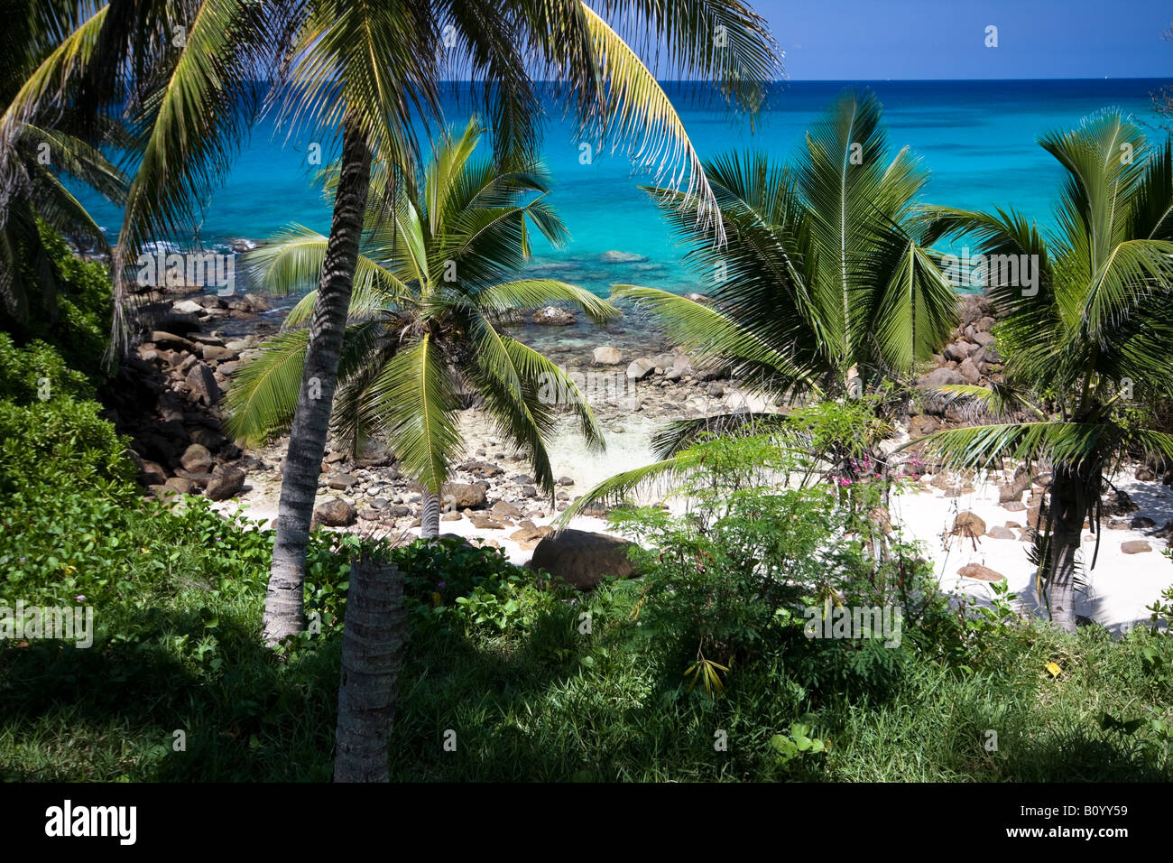 Hidden and secluded bay overlooking tropical beach in Seychelles Stock ...