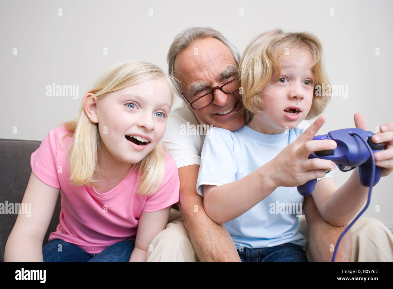 Family portrait three children tension hi-res stock photography and ...