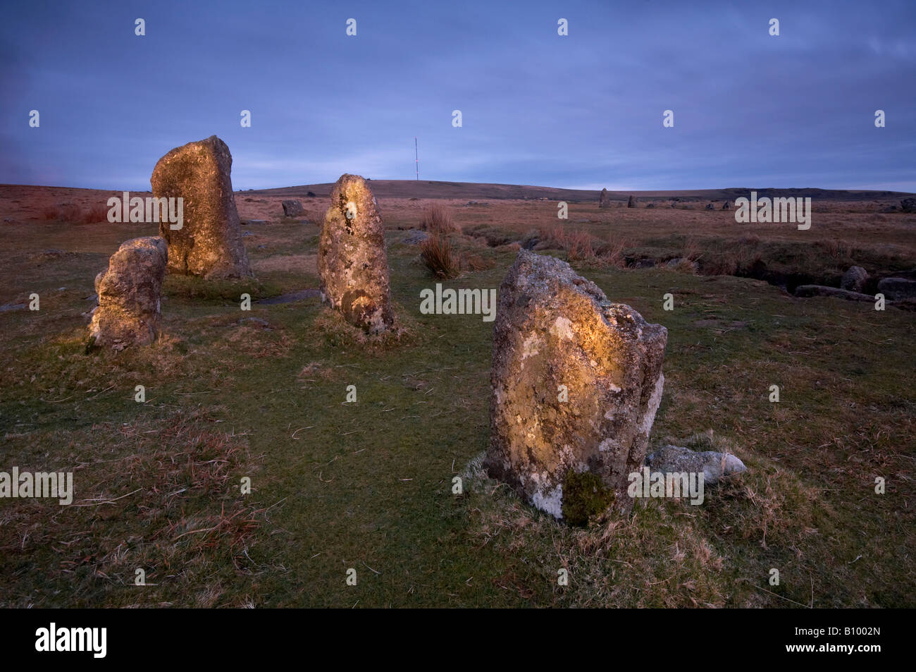 The spooky Merrivale stone row illuminated by torch light at night ...