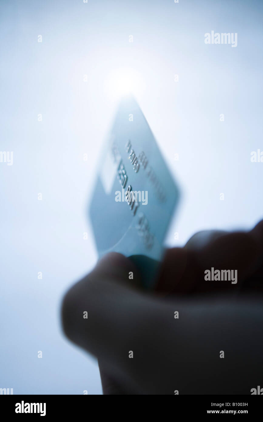 Credit card in hand Stock Photo - Alamy
