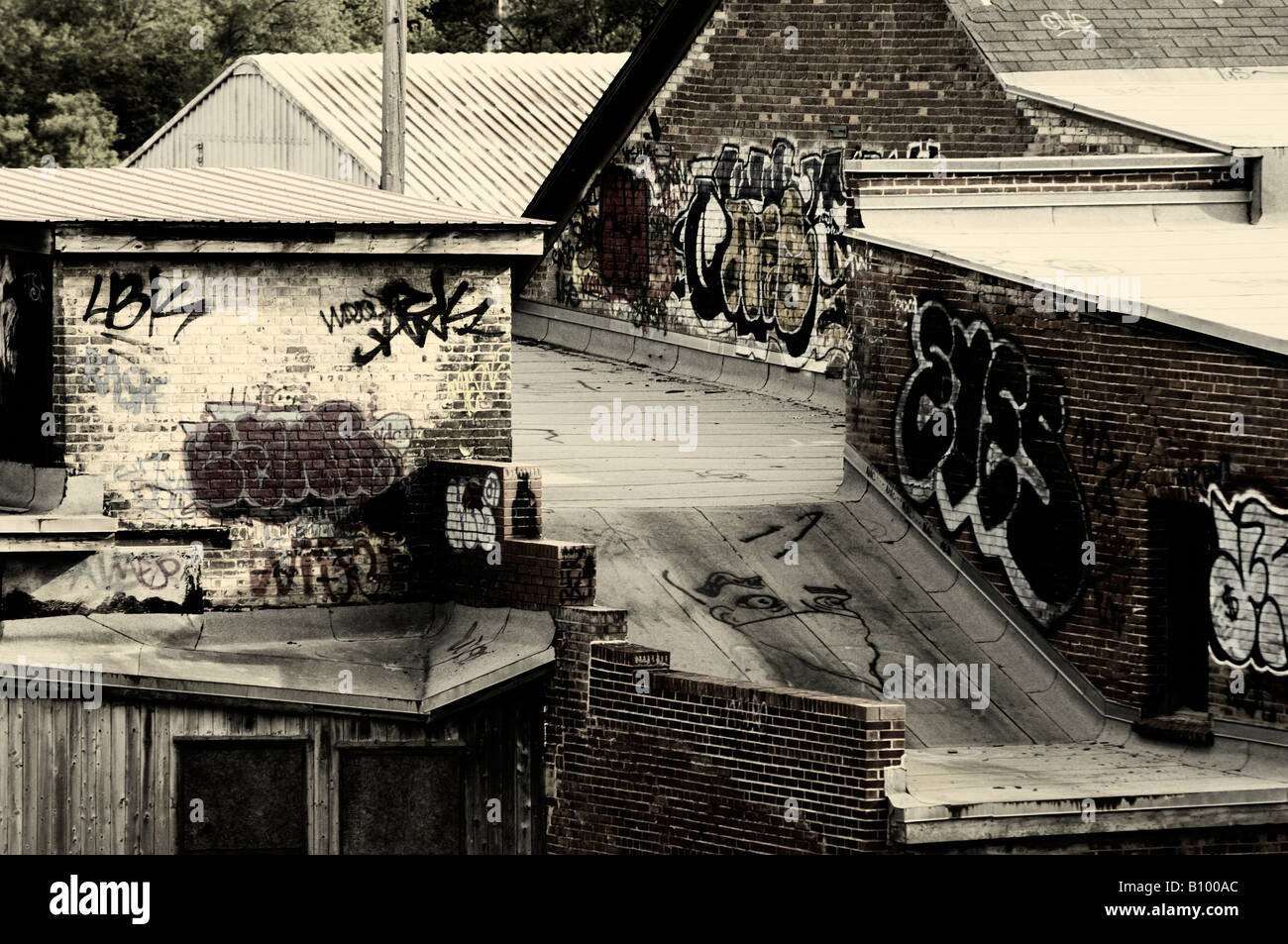 Graffiti on abandoned building roof Stock Photo - Alamy