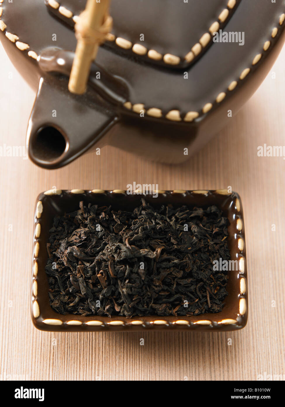 top view of chinese tea pot and tea leaves Stock Photo - Alamy