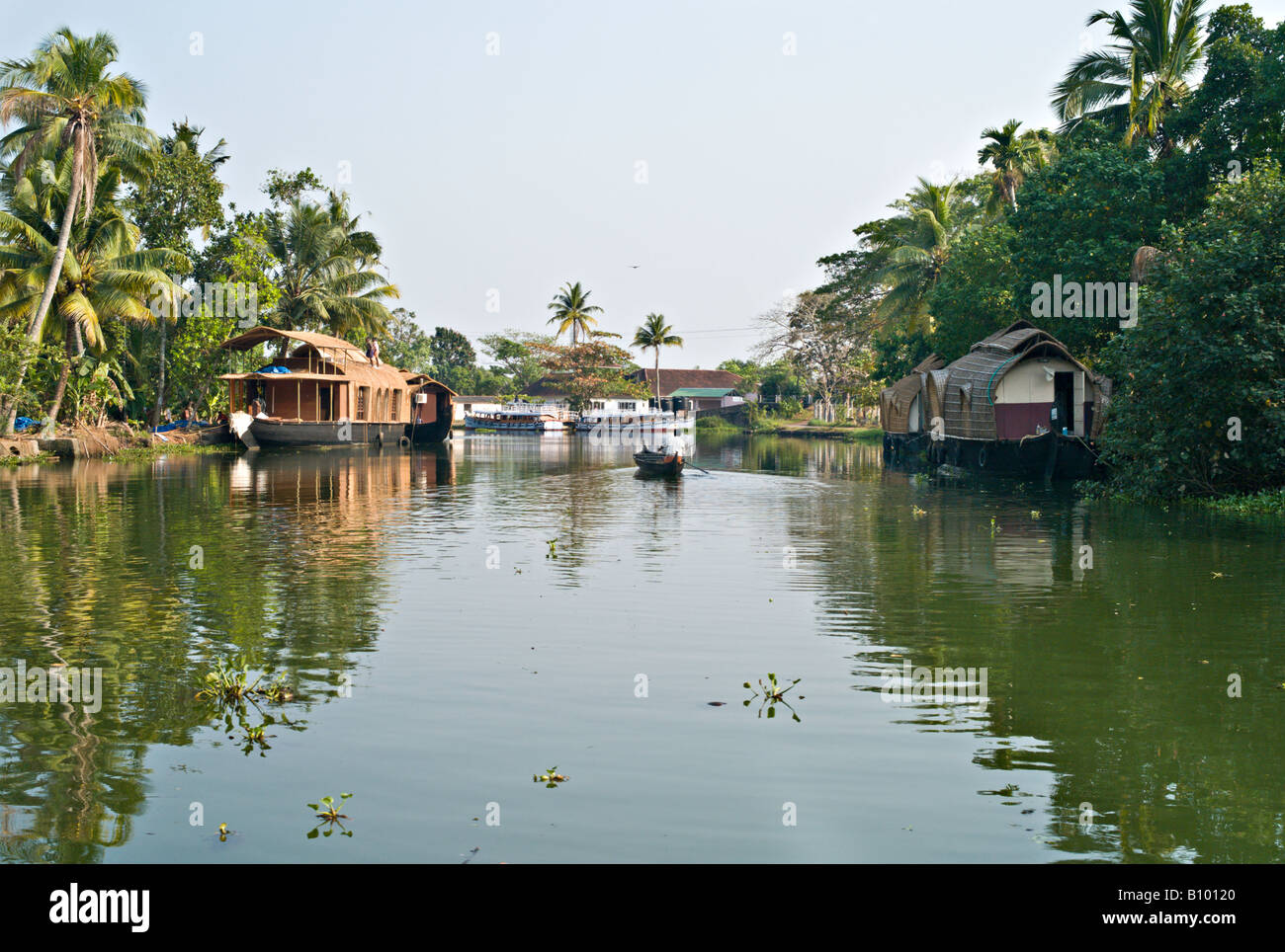 INDIA KERALA Renovated rice boats on canals in the backwaters of Kerala ...