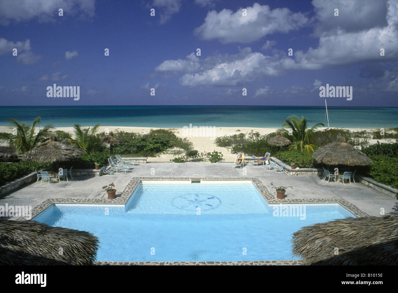 Meridian Club hotel swimming pool Beach behind Sea Straw huts Palms ...